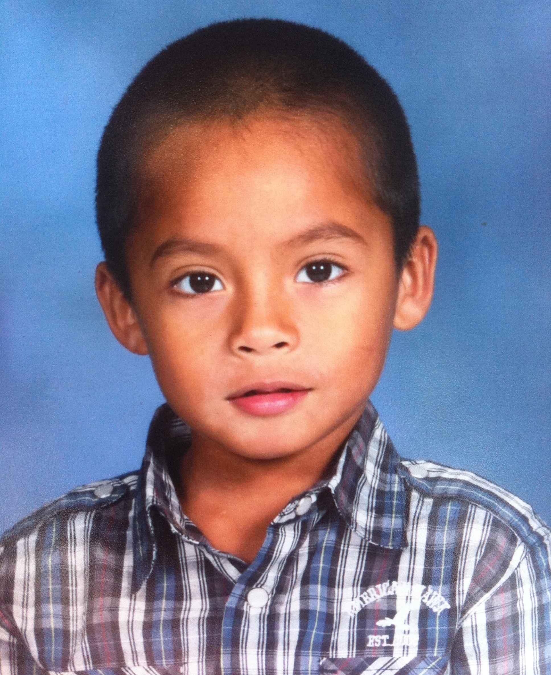 Search for boy continues at fire scene