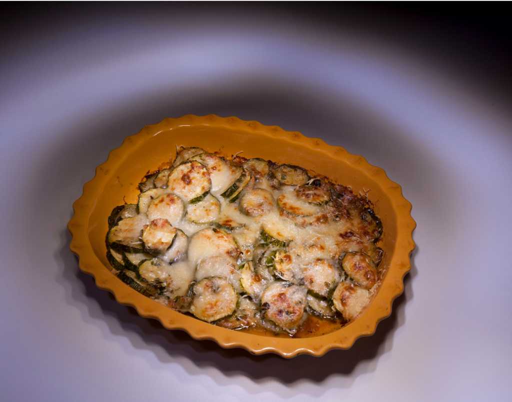 Dress up zucchini with herbs and cheese