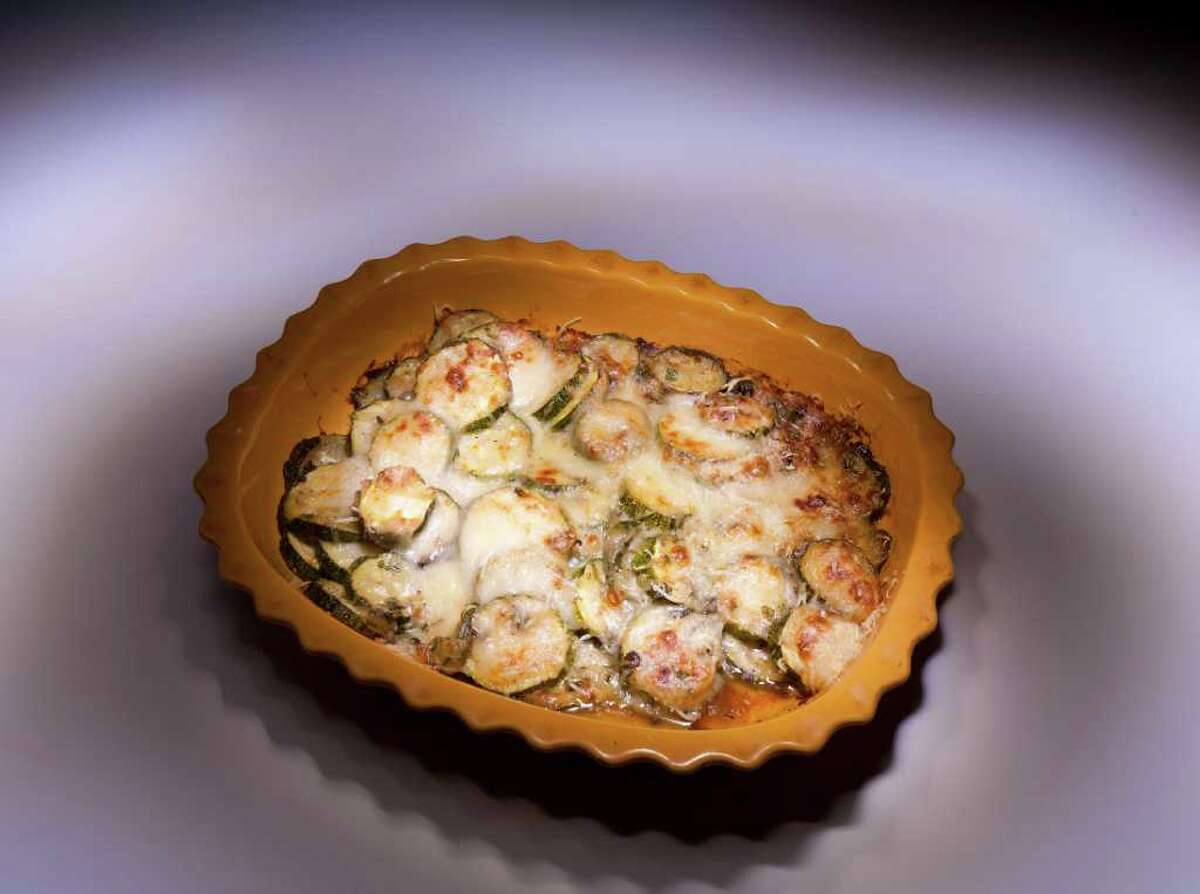 Dress up zucchini with herbs and cheese
