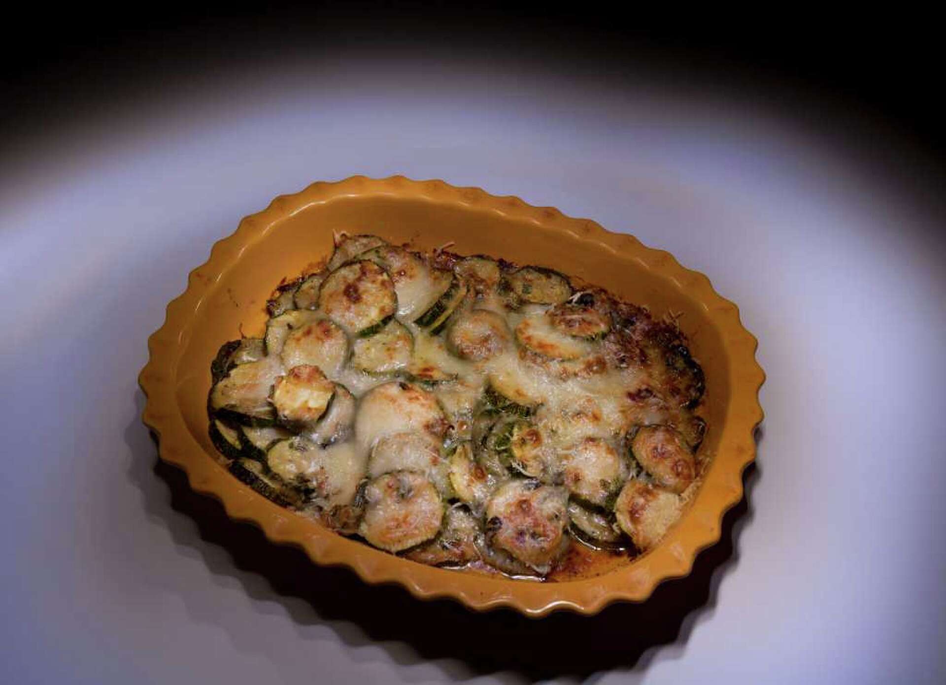 Dress up zucchini with herbs and cheese