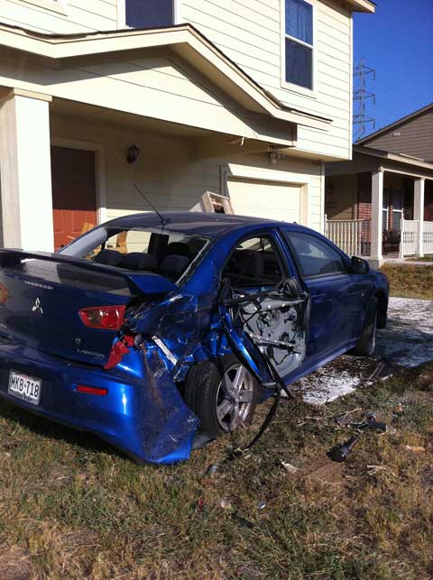 Cars barrel into home after early-morning wreck