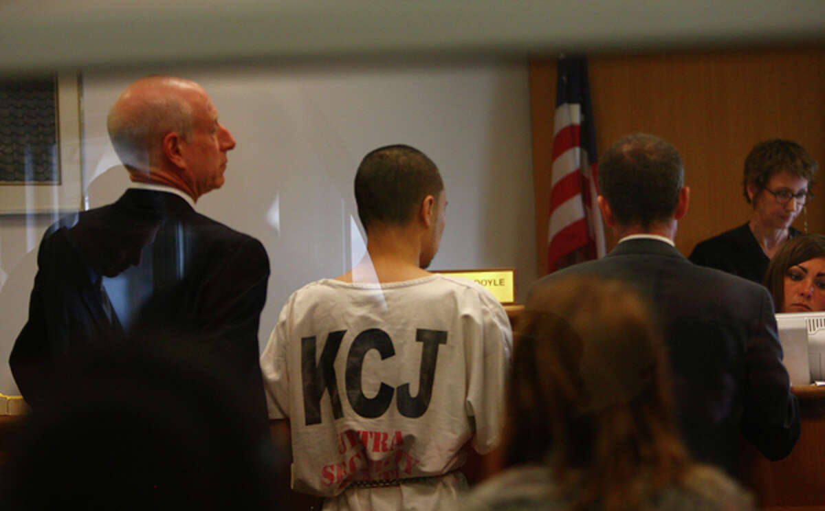 Seattle doctor admits to killing son, partner