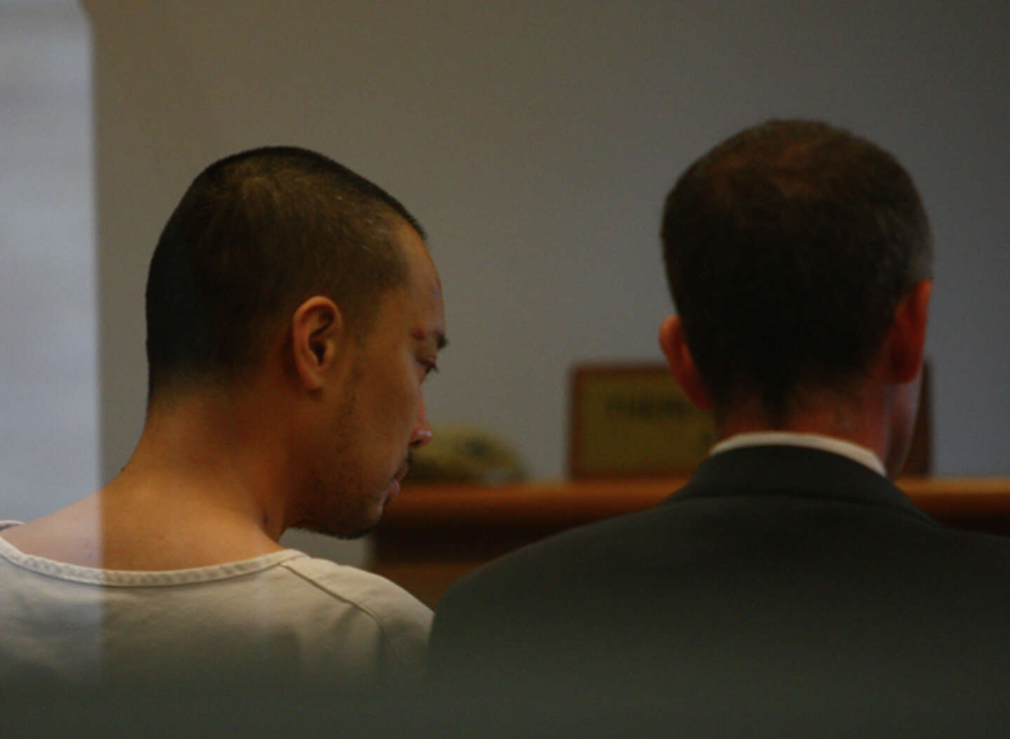 Seattle doctor admits to killing son, partner