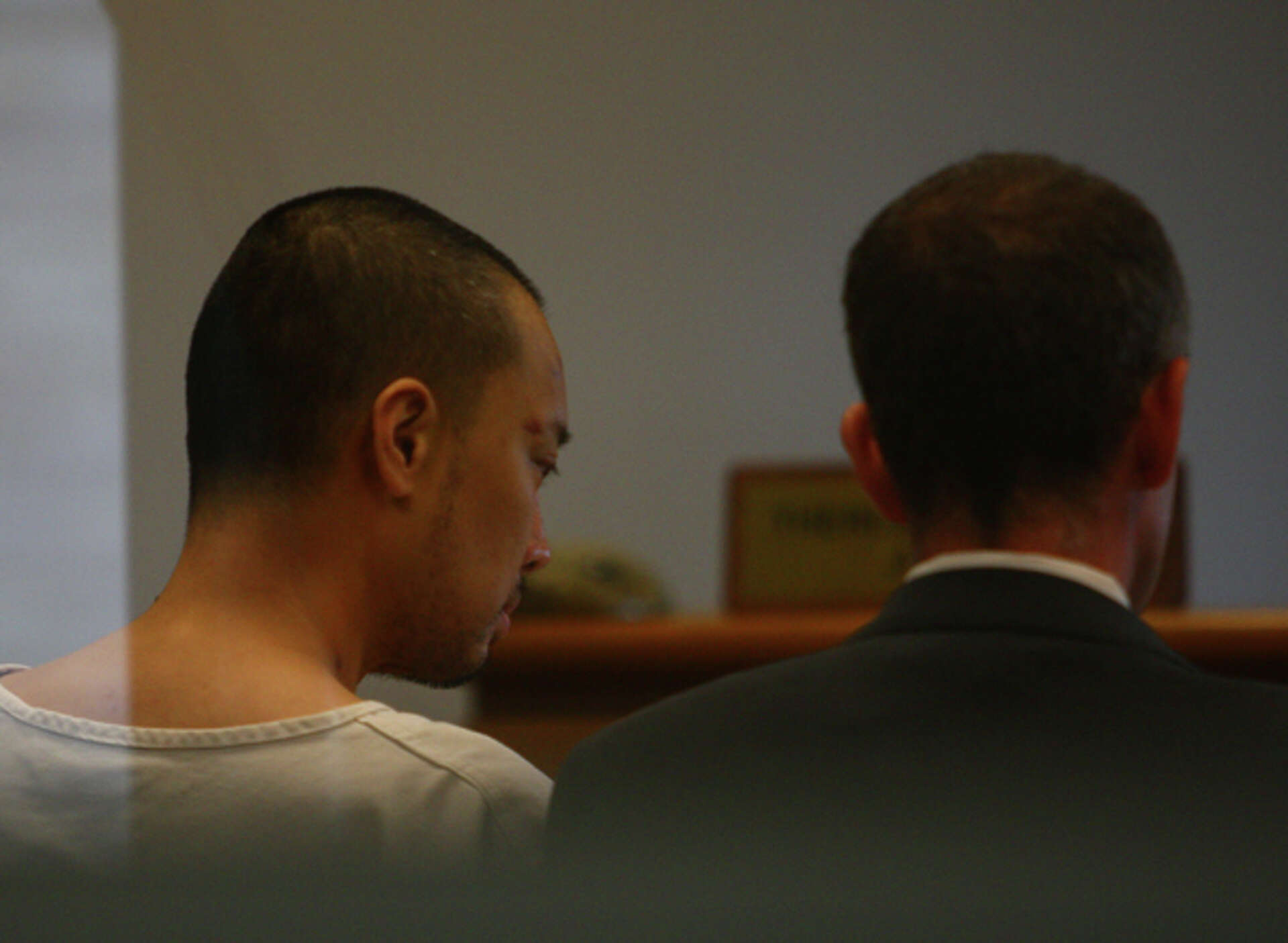 Seattle doctor admits to killing son, partner