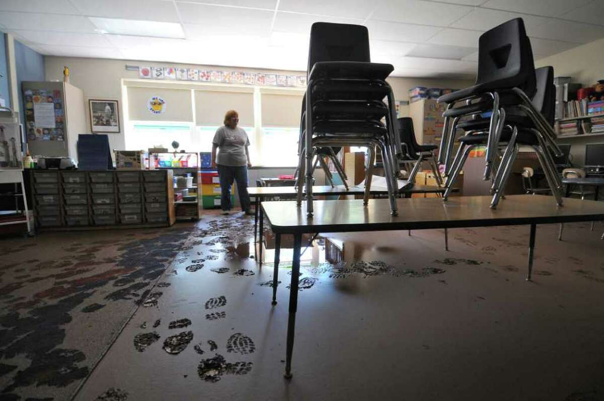 Schools rally towns hit by Irene