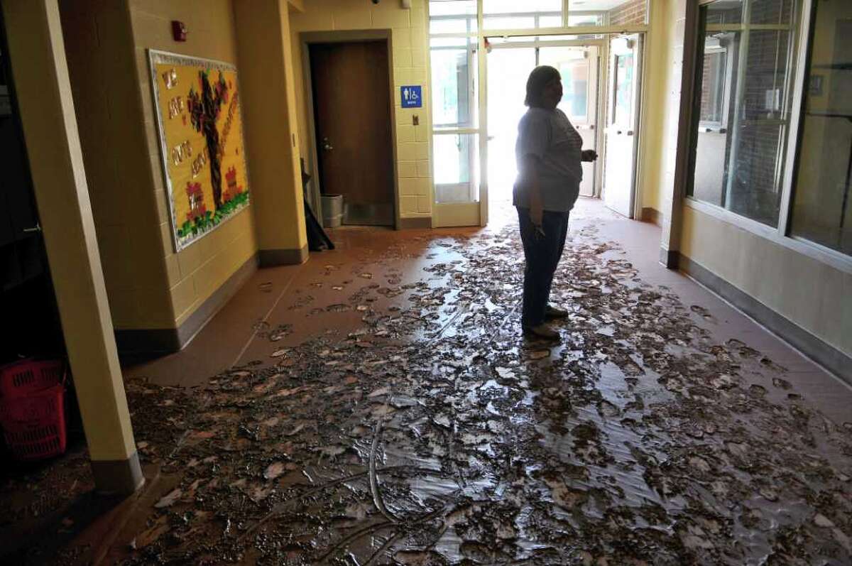 Schools rally towns hit by Irene