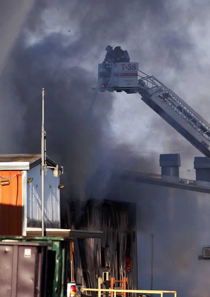 Warehouse fire caps grueling day for local firefighters