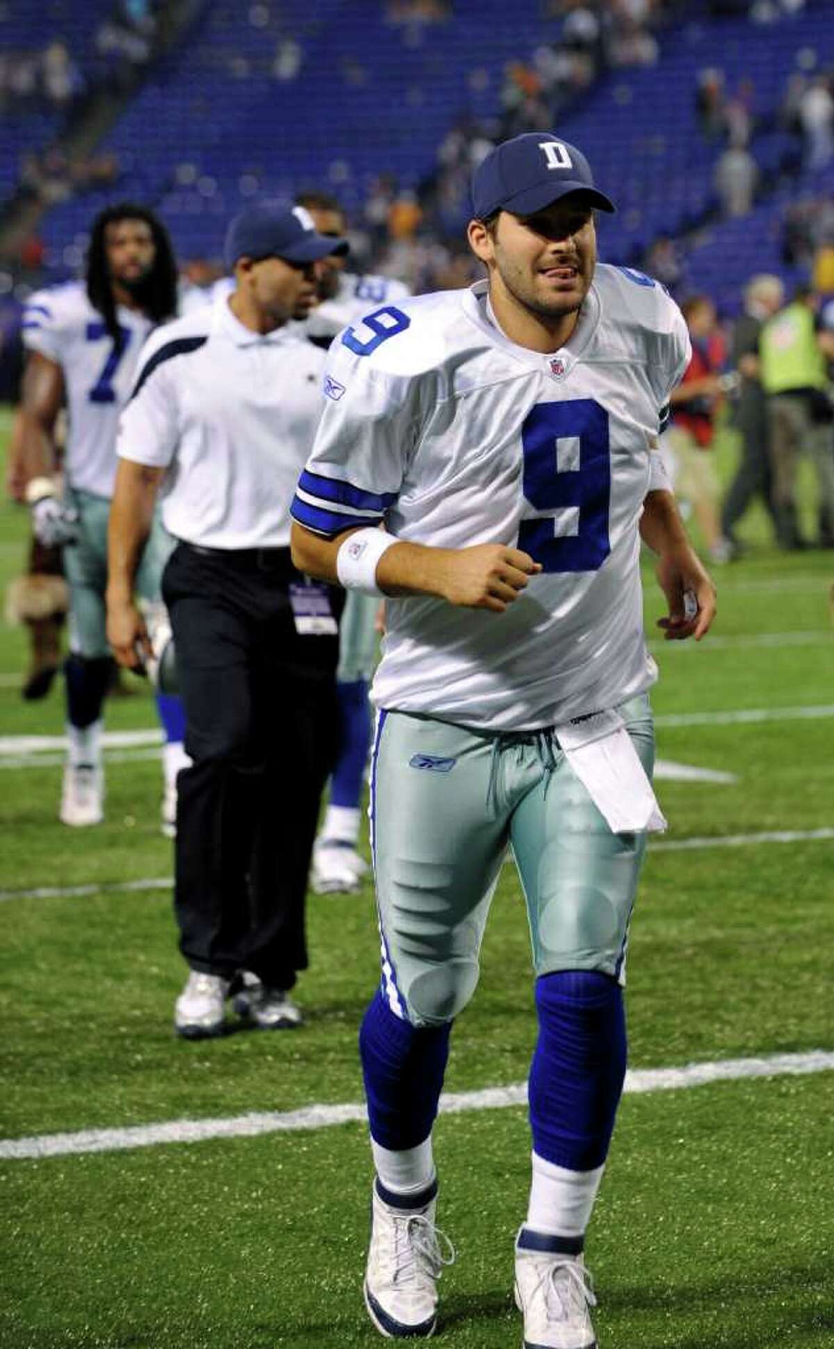 Cowboys' Romo says he'll play
