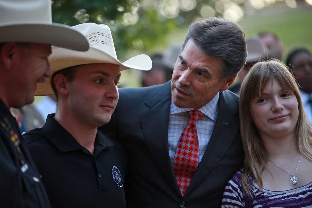 Even at tea party debate, Perry likely to be on hot seat
