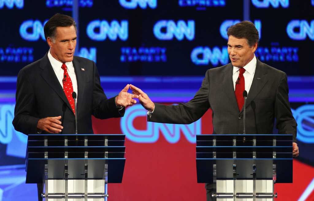Perry stands his ground in GOP debate