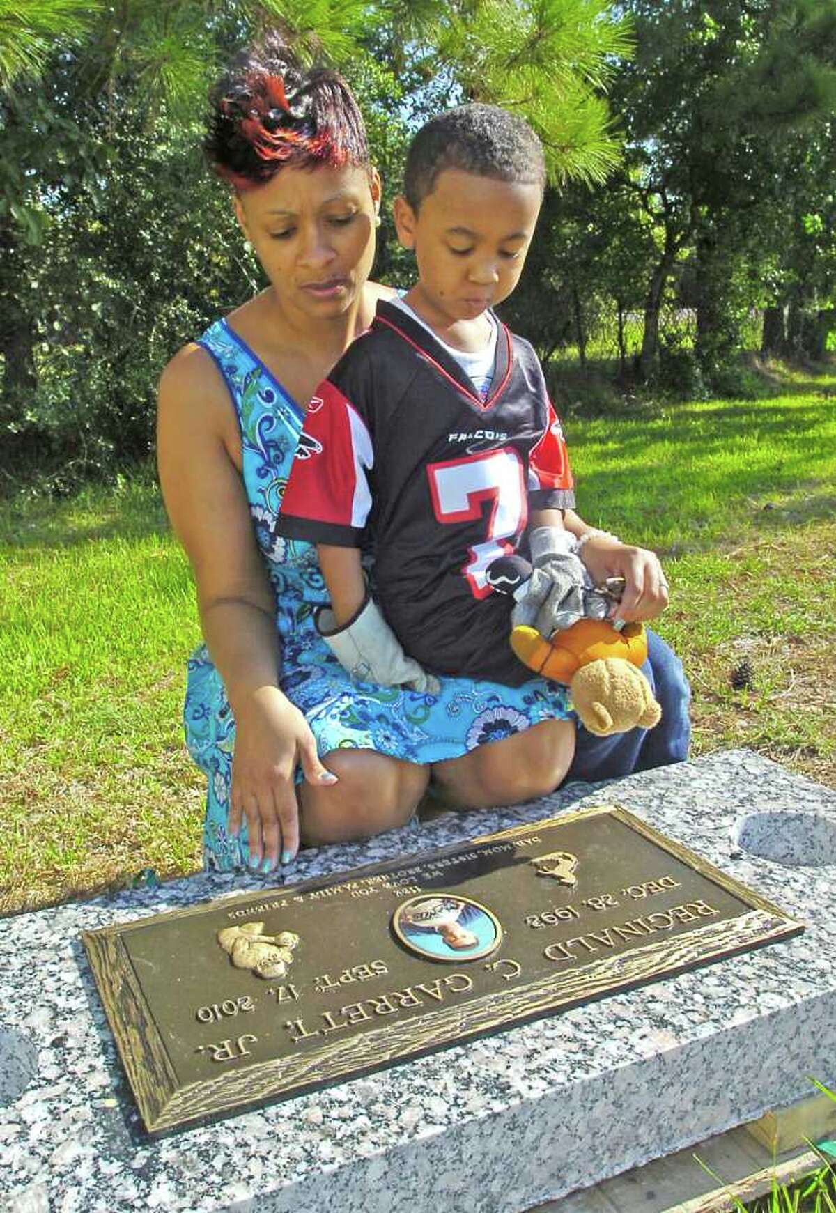 One year later, late West Orange-Stark football player Reggie Garrett ...