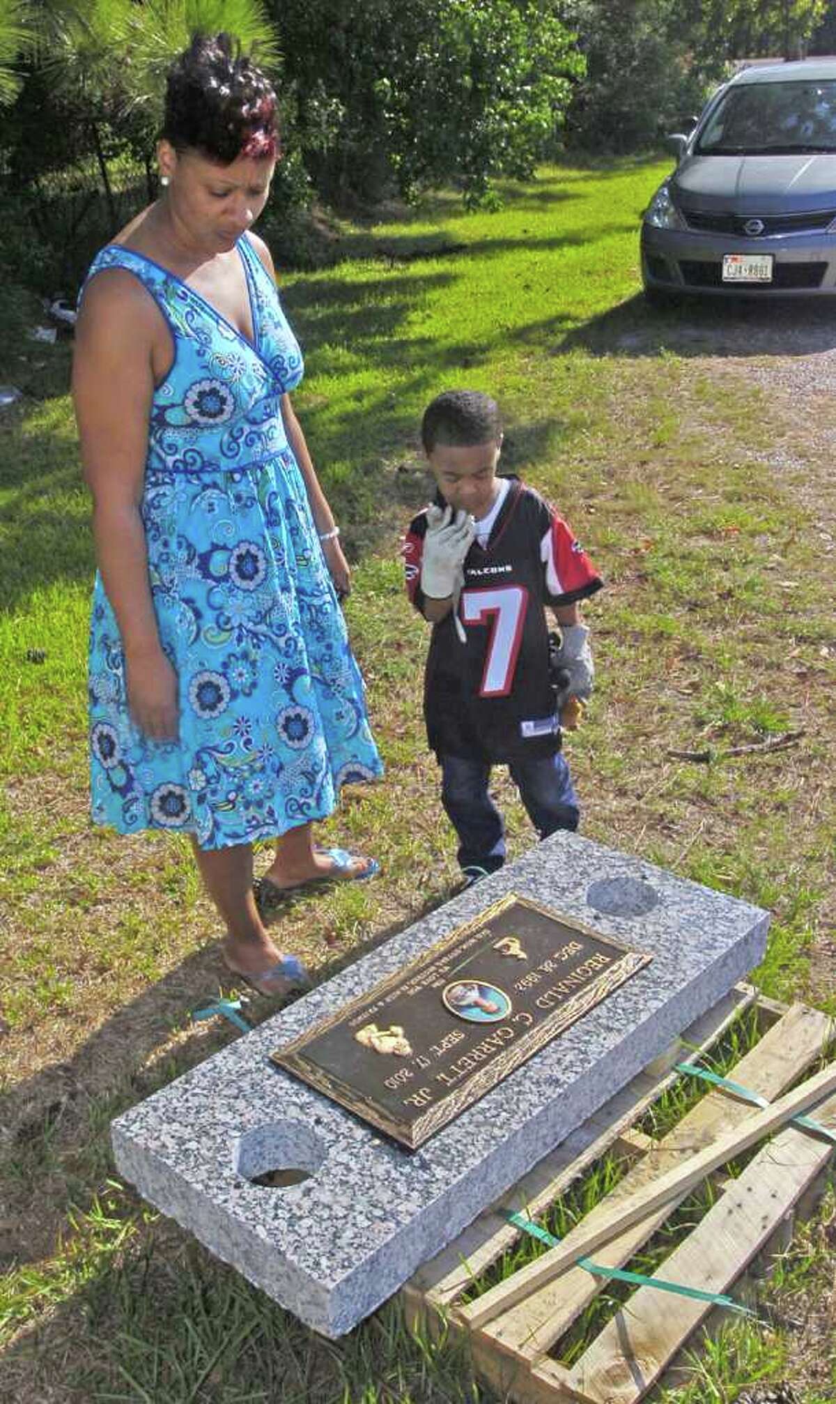 One year later, late West Orange-Stark football player Reggie Garrett ...