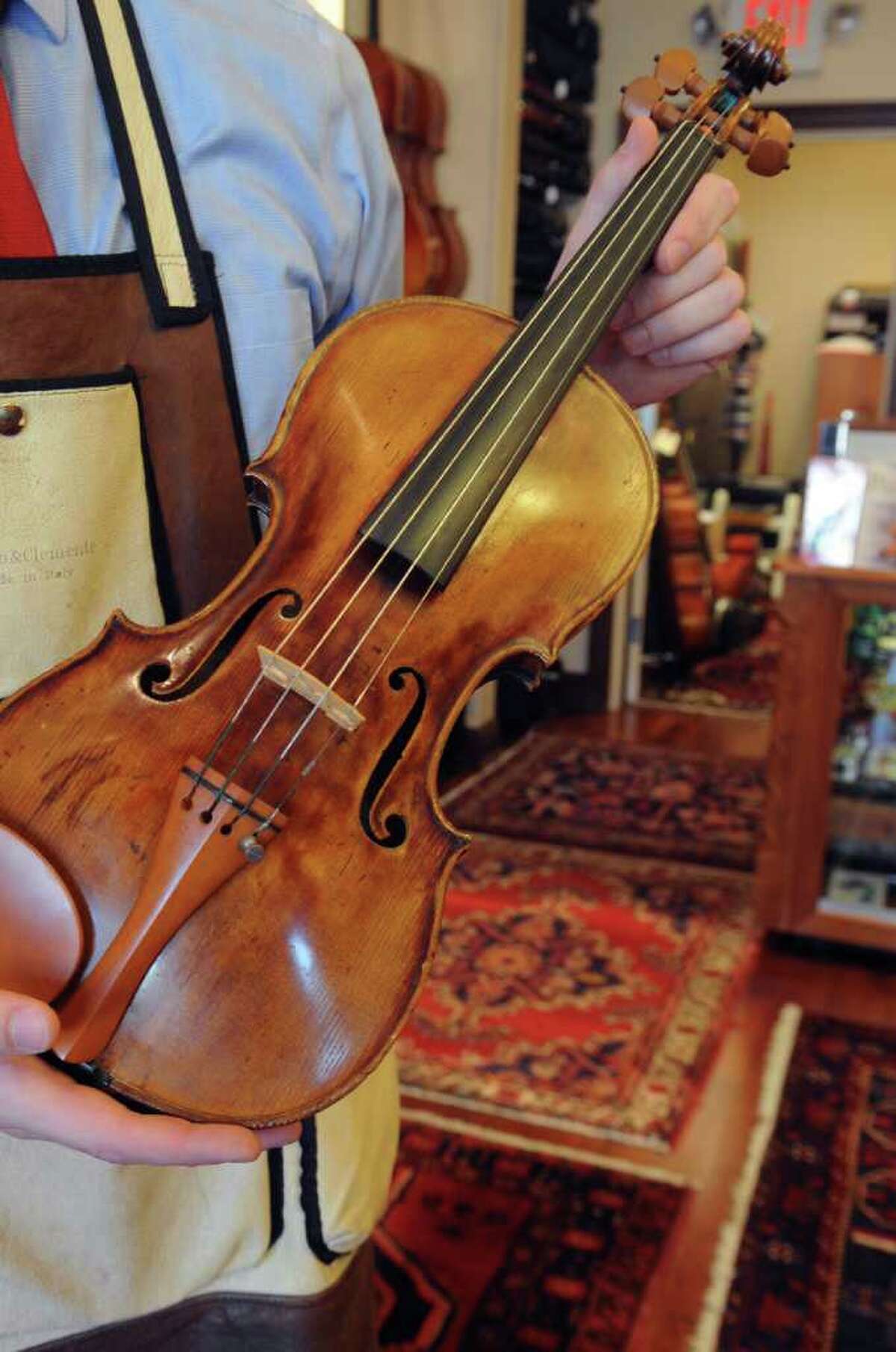 Greenwich luthiers practice the art of crafting sound