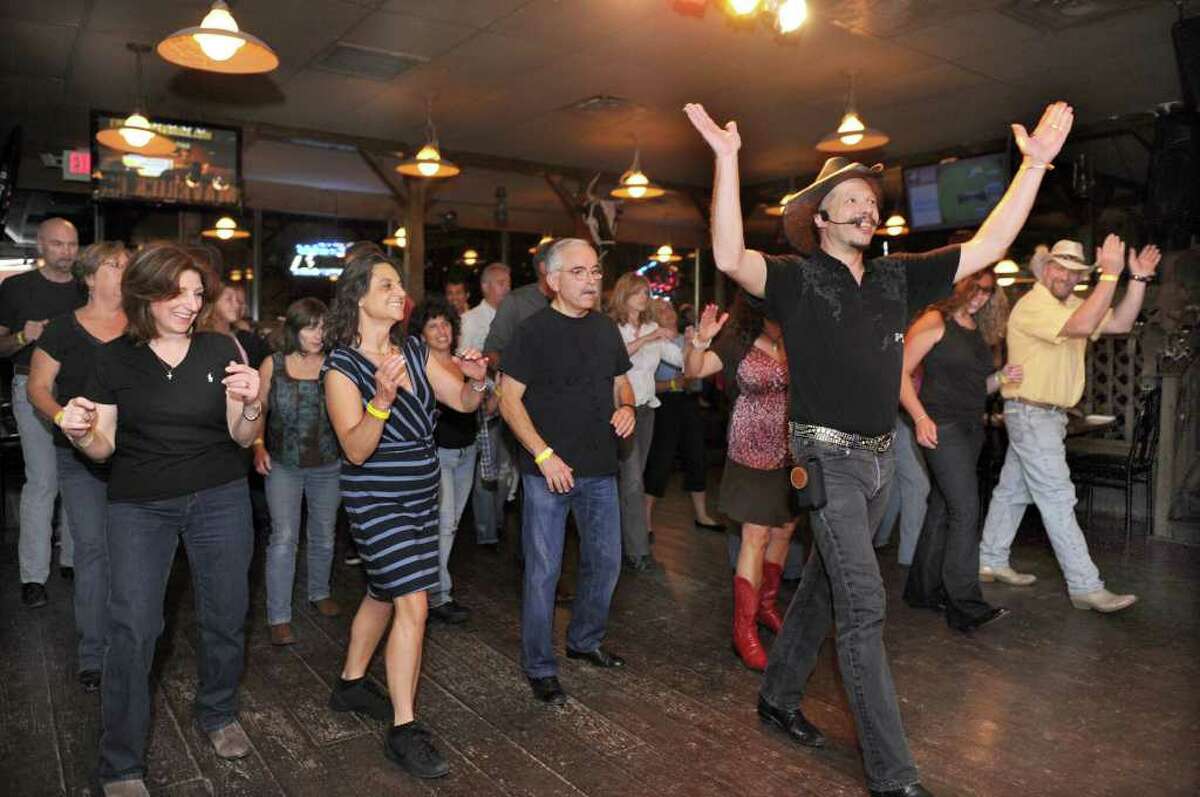 Customers kick up their heels for country music, line dancing in Danbury