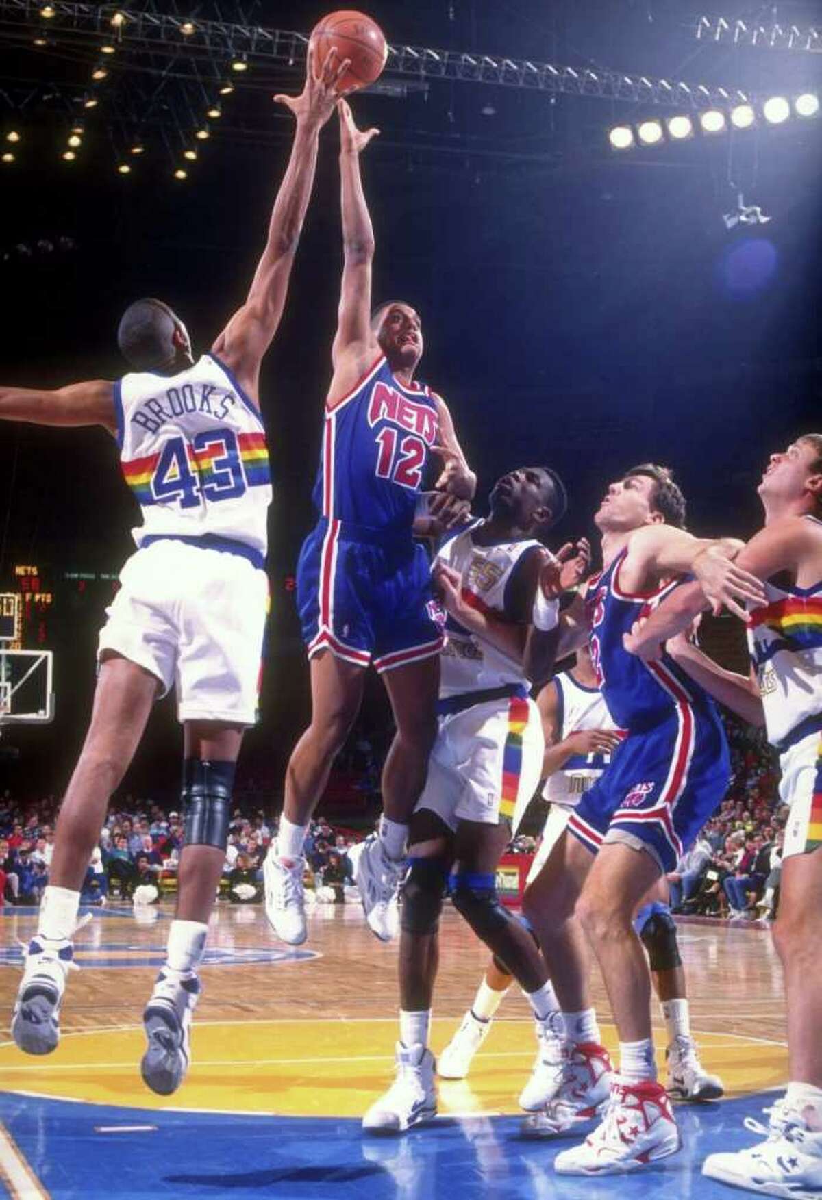 Tate George, hero in UConn's Dream Season, charged in $2 million Ponzi ...