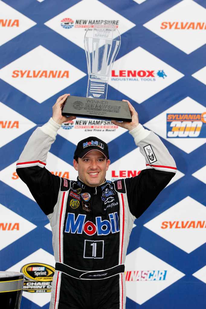 Motor sports: Stewart wins again to lead Chase