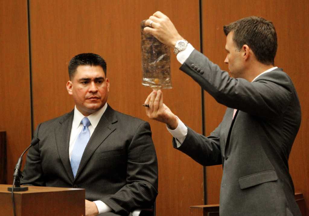 Jackson aide says Murray tried to hide medicine