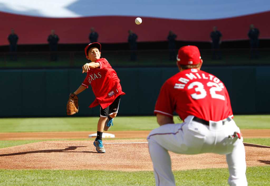 Son of man who fell to his death throws first pitch at Rangers game