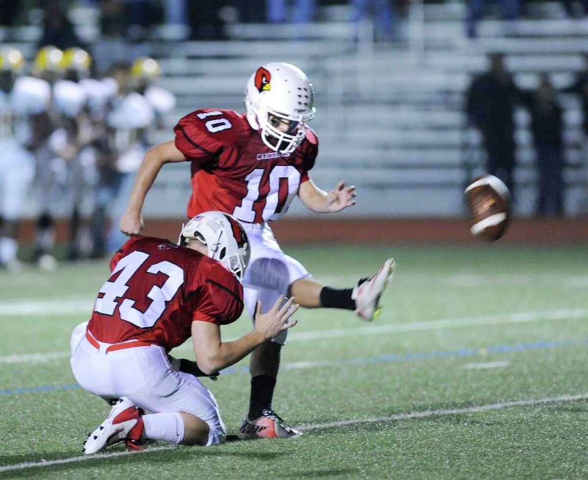 Greenwich football team can't keep pace with New London