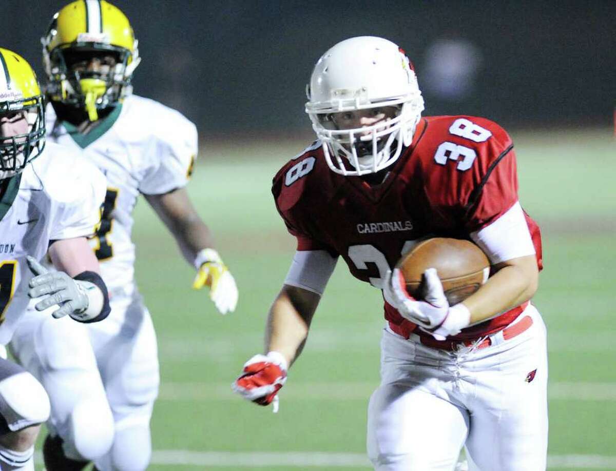 Greenwich football team can't keep pace with New London