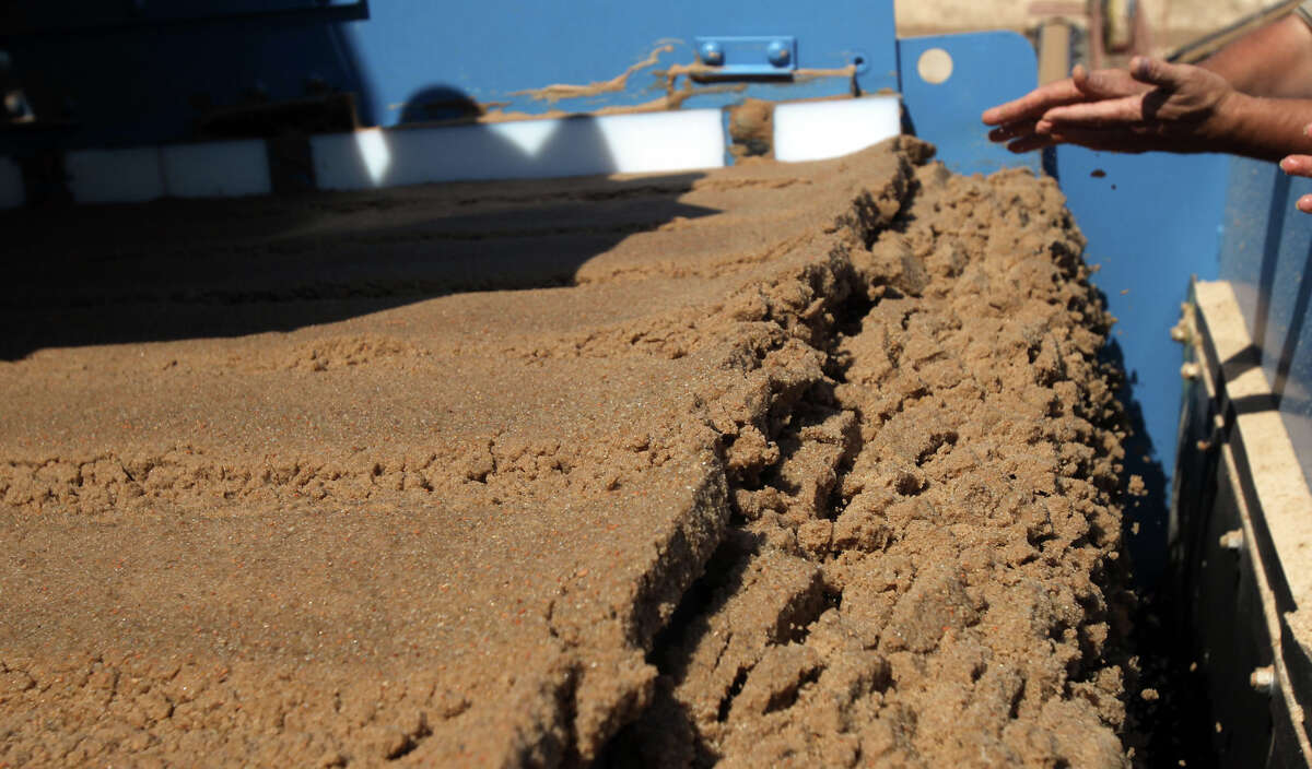 Mining for sand extracts a price