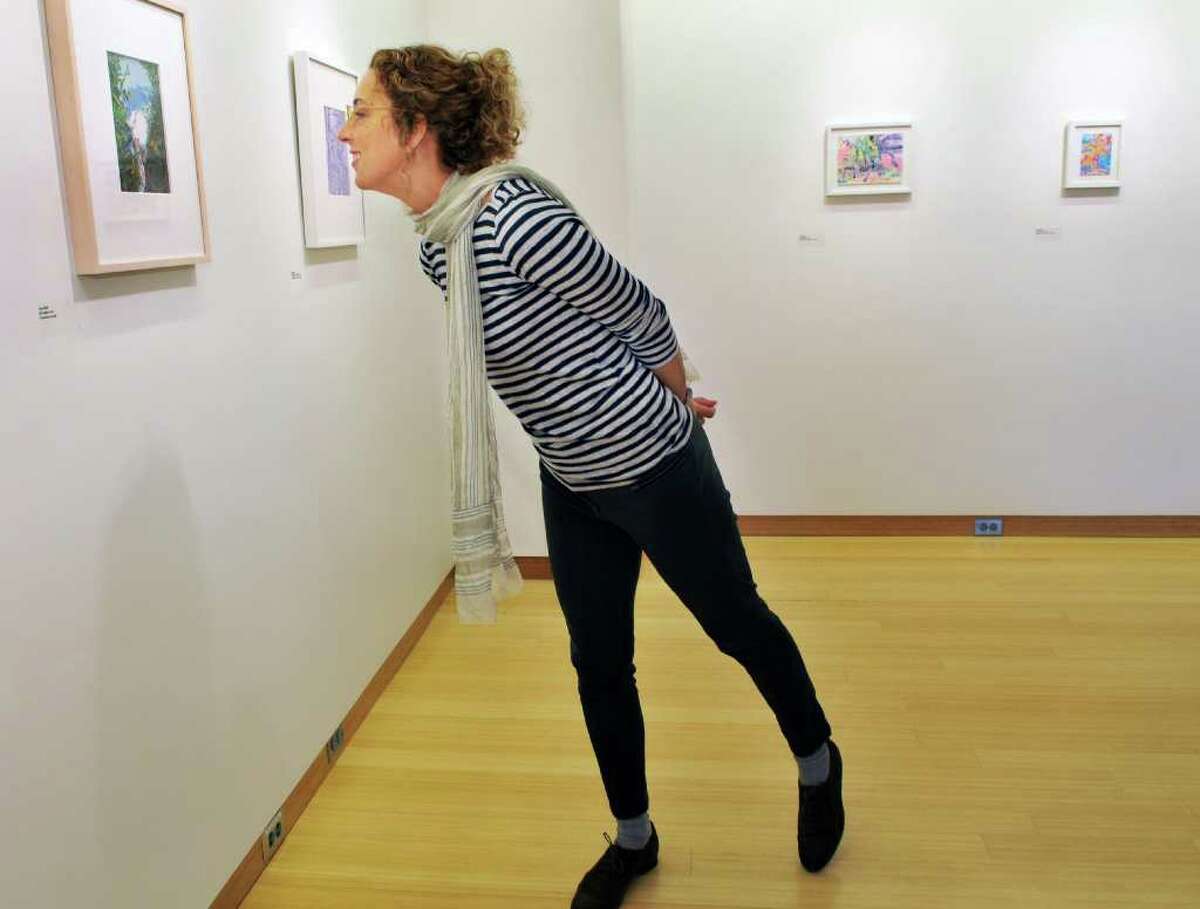 In Ann Wolf's art, the intensity of small worlds