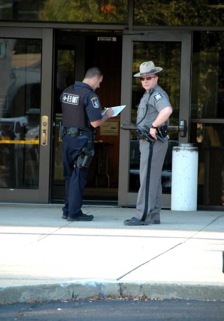 Cops shoot man in paper's office