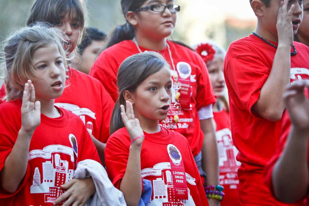 Red-ribbon week rally honors slain ICE agent