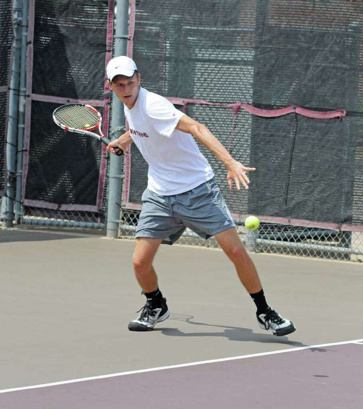 Team tennis: Lobos move on as champs