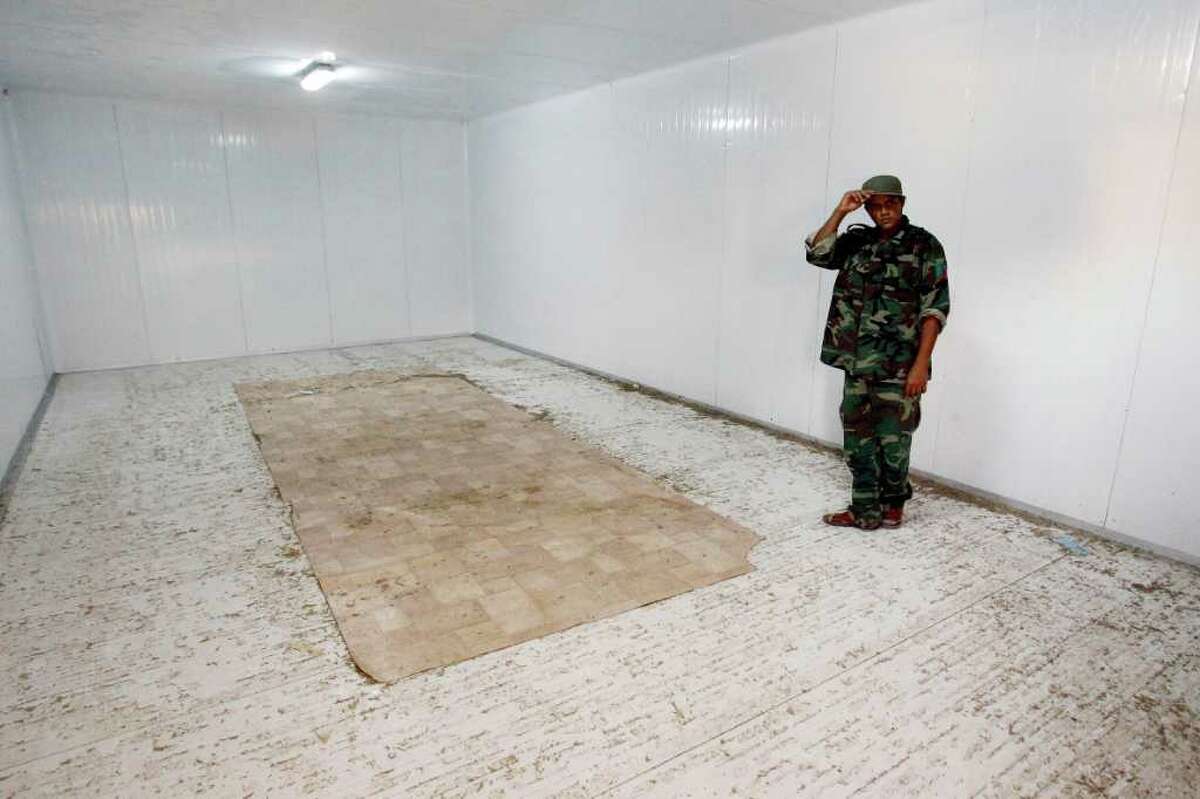 Gadhafi buried in Libya desert