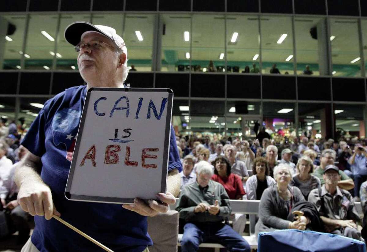 Cain electrifies crowd at tea party rally