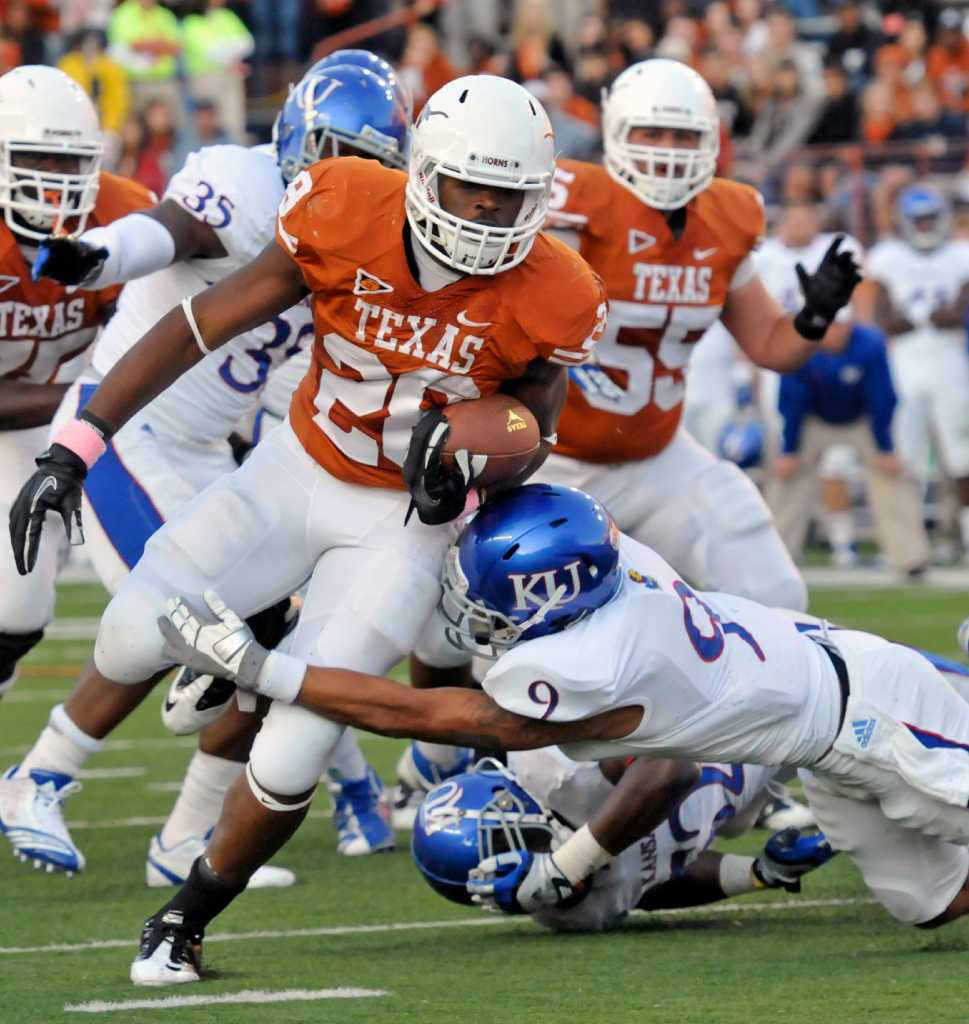 UT uses ground game to gash Kansas 43-0