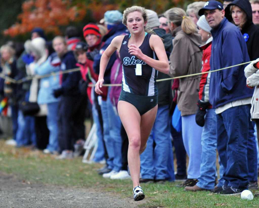 Shen's Predmore runs for the repeat
