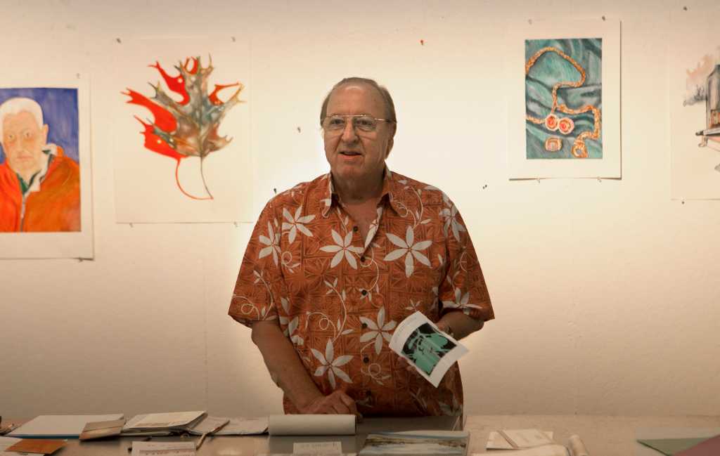 Students line up for beloved artist and art teacher Arthur Turner