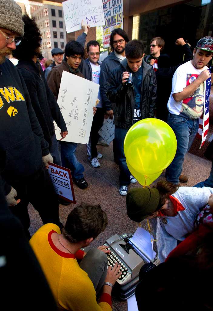 First-time protesters join Occupy Houston march on downtown banks