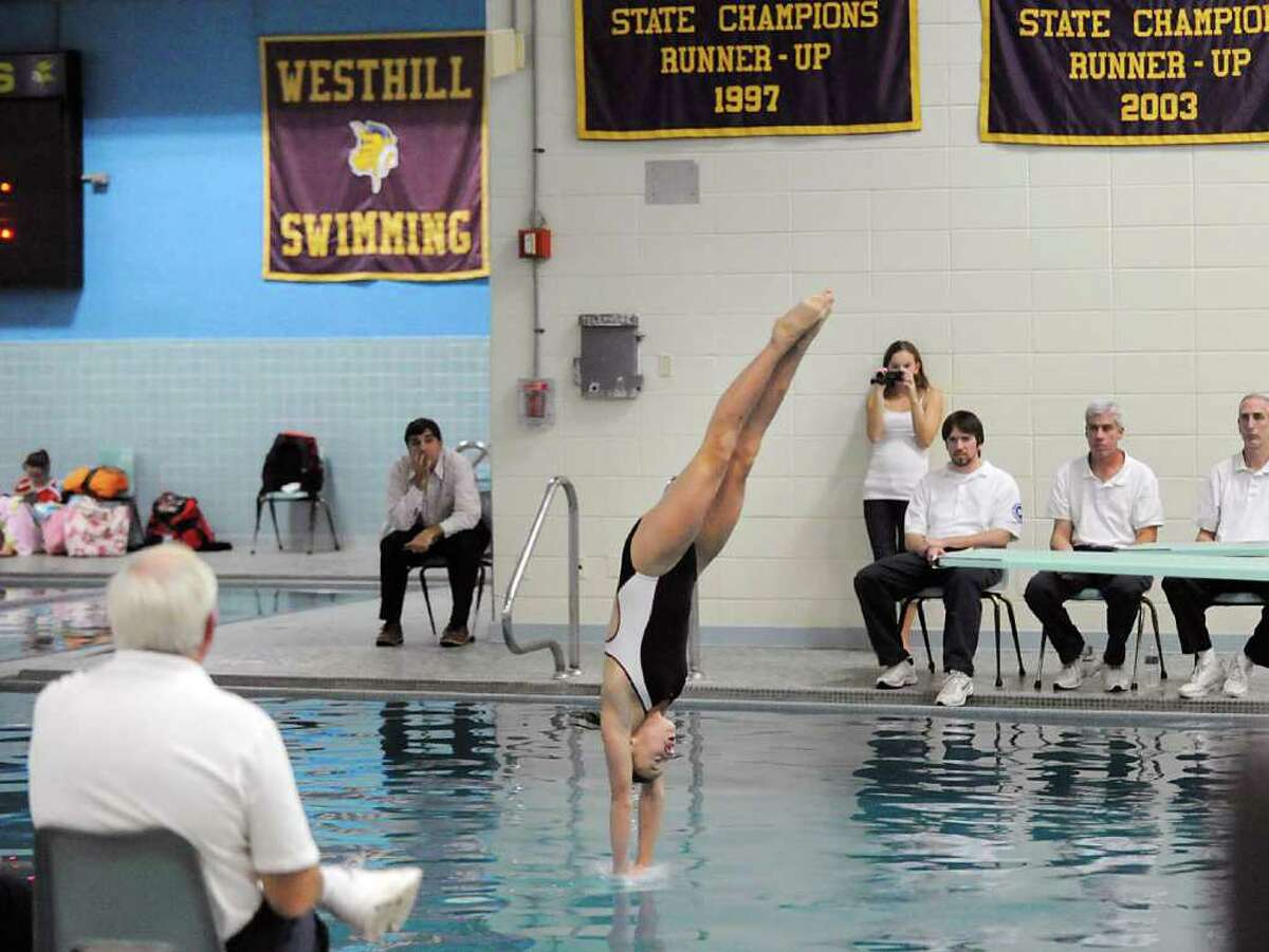 Wilton's Warburg wins fourth straight FCIAC diving crown