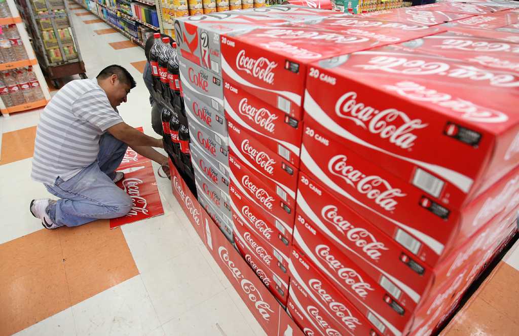 Sales pop as Coke refreshes strategy