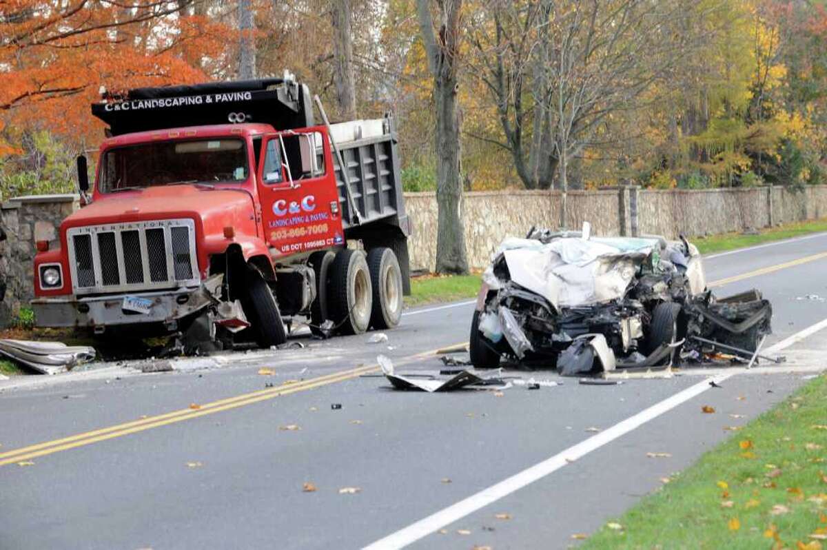 Woman severely injured in dump truck crash on North Street