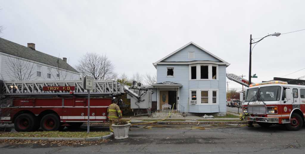Building burning in Troy