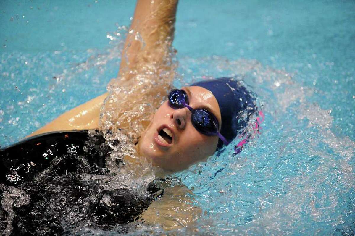 Pomperaug's McDonald wins two State Open swim titles