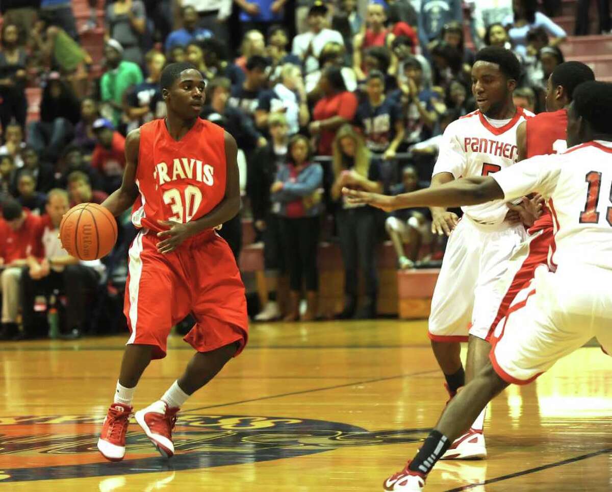 Boys basketball: Travis starts season strong