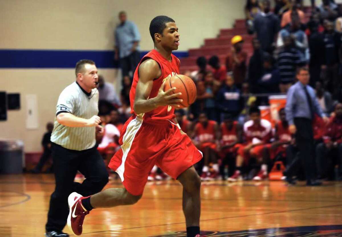 Boys basketball: Travis starts season strong