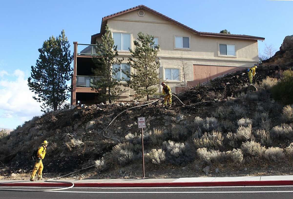 Wind-driven wildfire destroys 25 homes in Reno