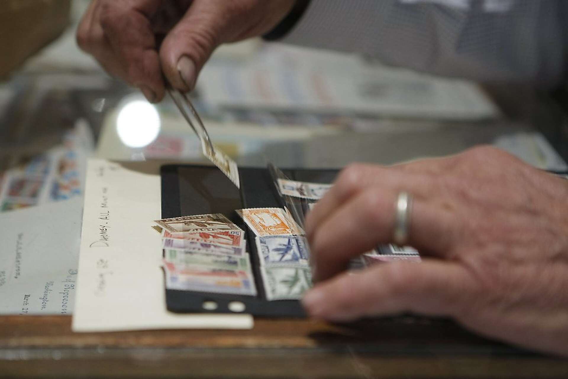 S.F. stamp dealer sticks with family business
