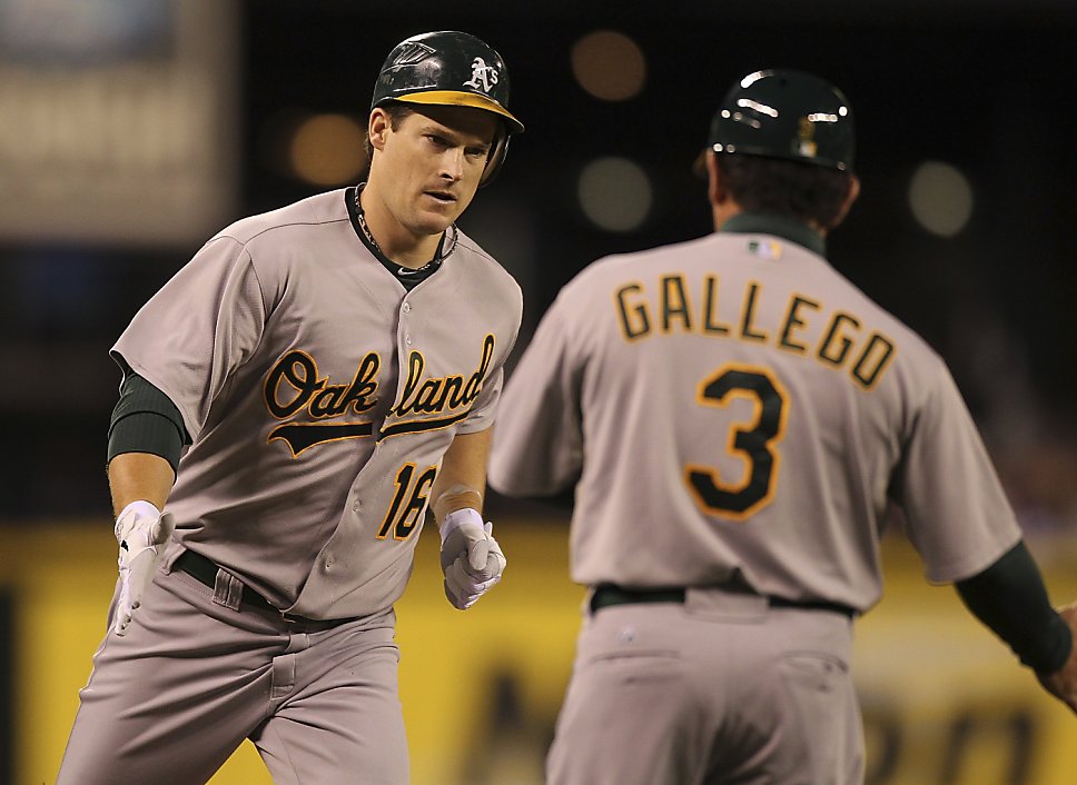Willingham's blast sets tone as A's win in Seattle