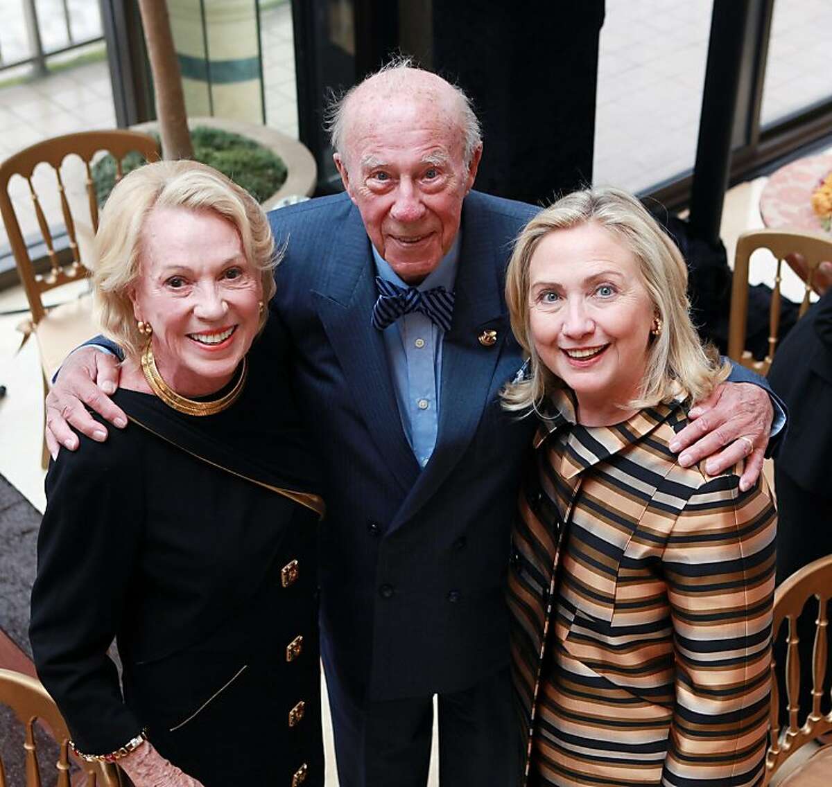 Shultzes, Clinton gather for diplomatic mission