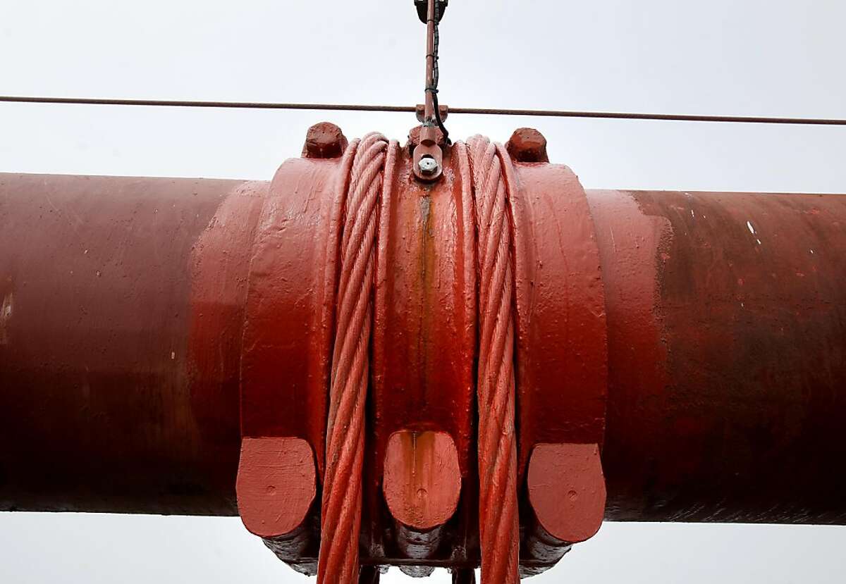 Golden Gate's cables getting repainted end to end