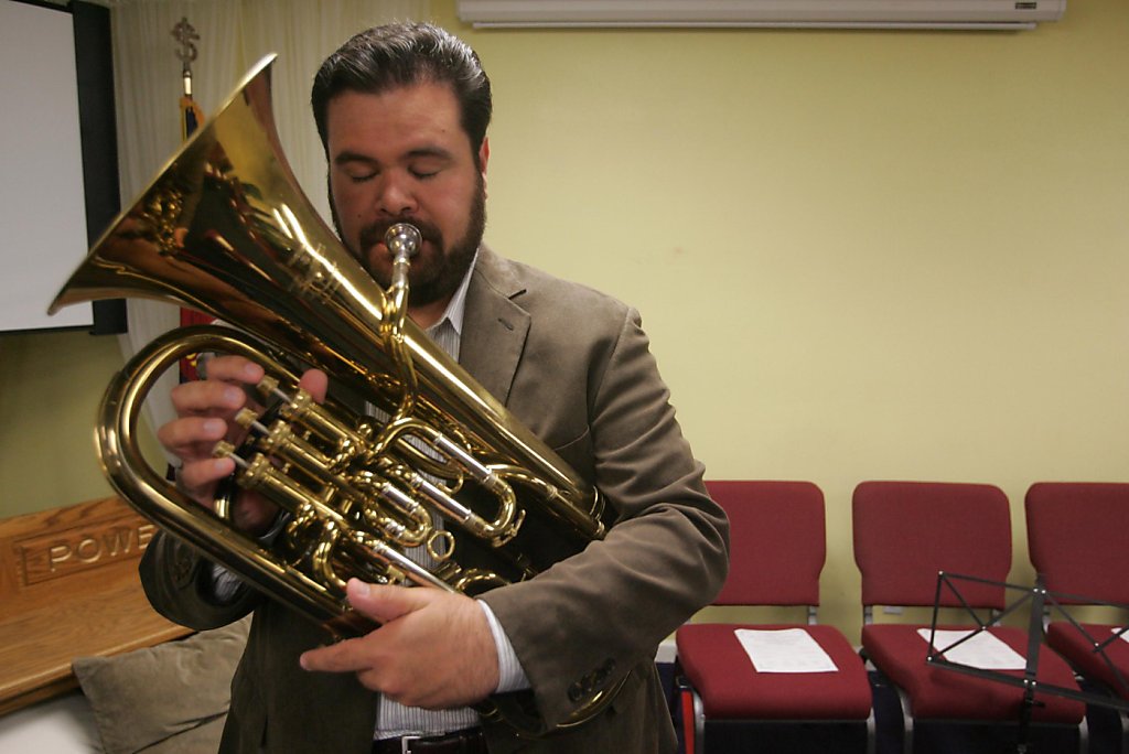 Adrian Quince strikes up the band - even 3 of them