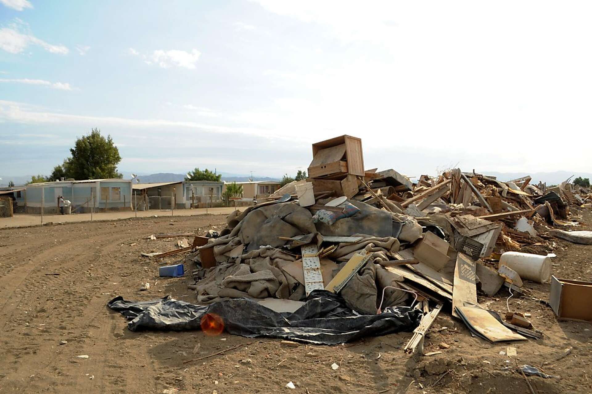 On edge of a desert paradise, Coachella farm workers live in putrid ...