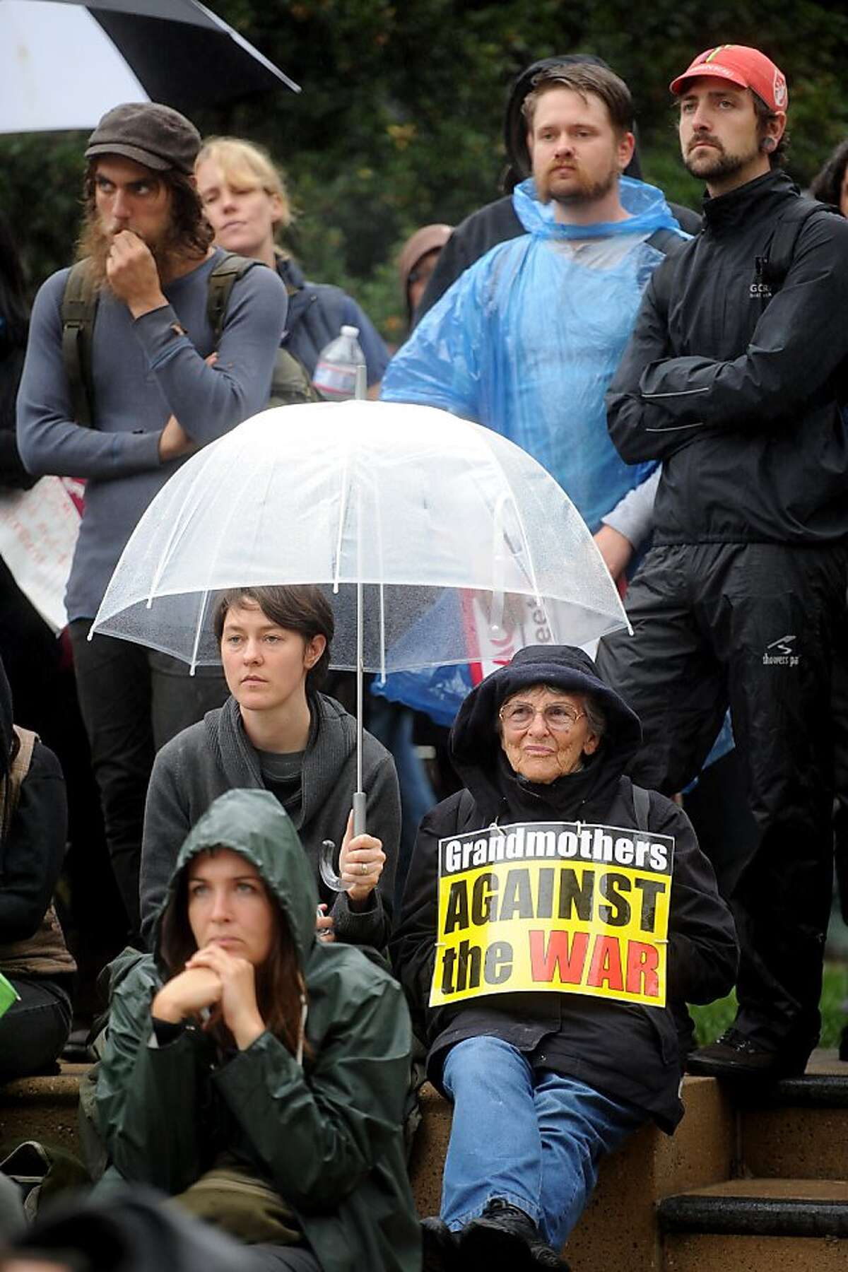 Activists scatter before police raid vacant hotels